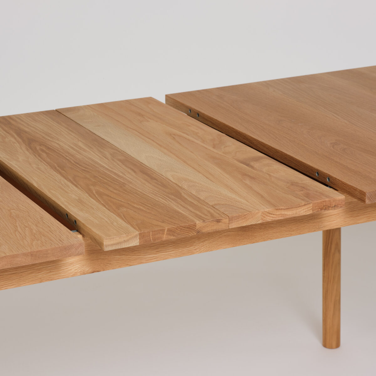 Extending Solid Oak Dining Table by ANOTHER COUNTRY